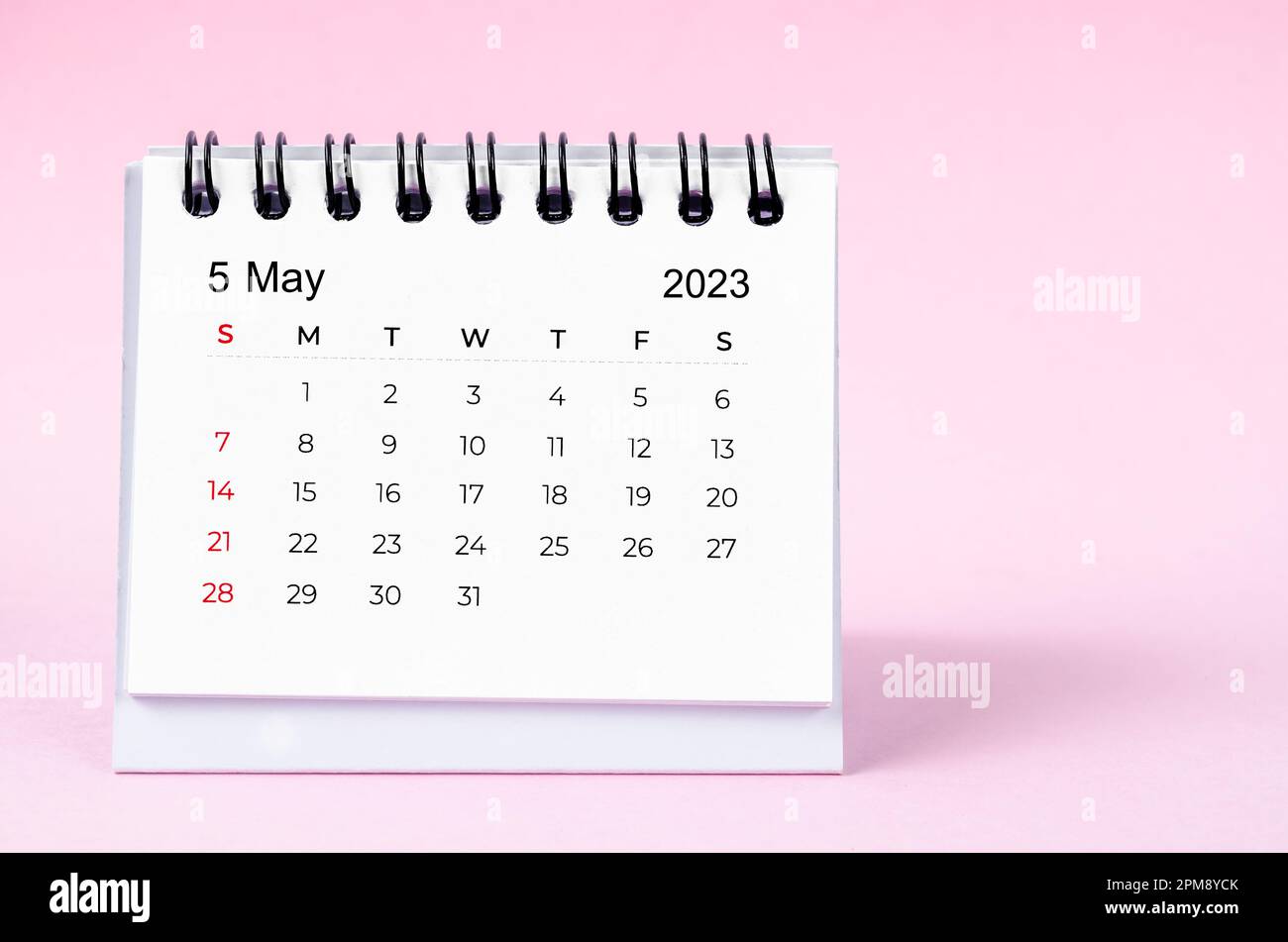 May 2023 desk calendar on pink colour background Stock Photo - Alamy