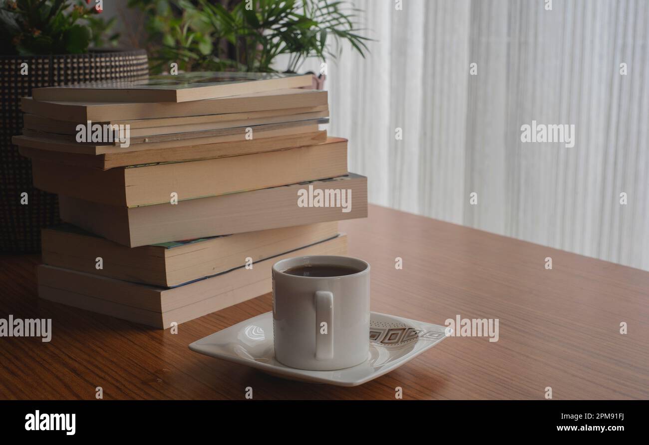 books lying on a wooden table.top view Stock Photo - Alamy