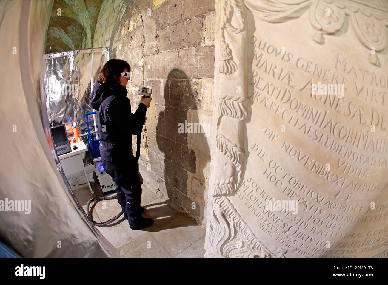 12 April 2023, Saxony-Anhalt, Halberstadt: Restorer Corinna Grimm-Remus ...
