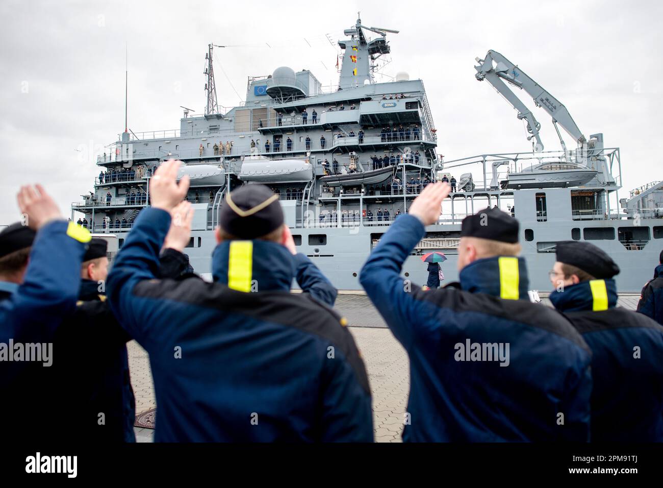 Wilhelmshaven, Germany. 12th Apr, 2023. Navy soldiers wave to their ...