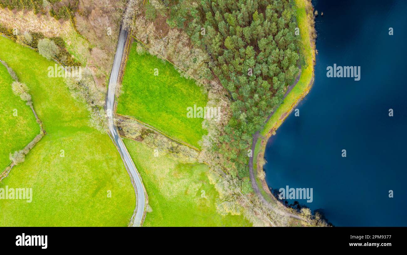 Aerial view, top down view, of a winding country road in the North ...