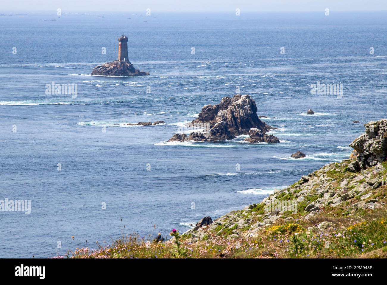 The Pointe du Raz and the Vieille lighthouse. Brittany. Finistère Stock ...