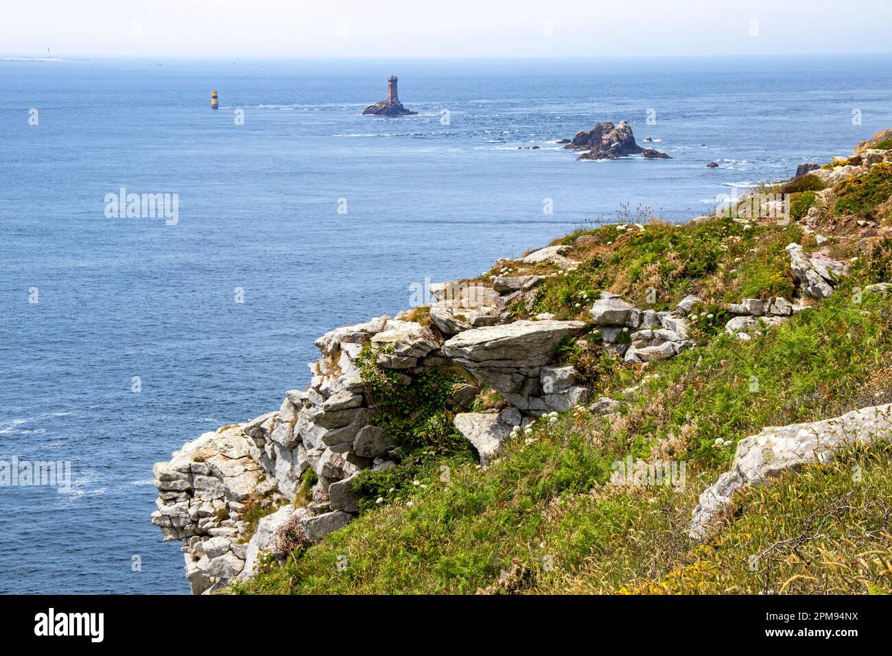 The Pointe du Raz and the Vieille lighthouse. Brittany. Finistère Stock ...