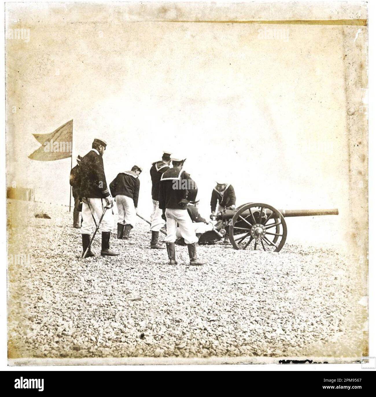 Firing an artillery cannon / gun on a beach Stock Photo - Alamy