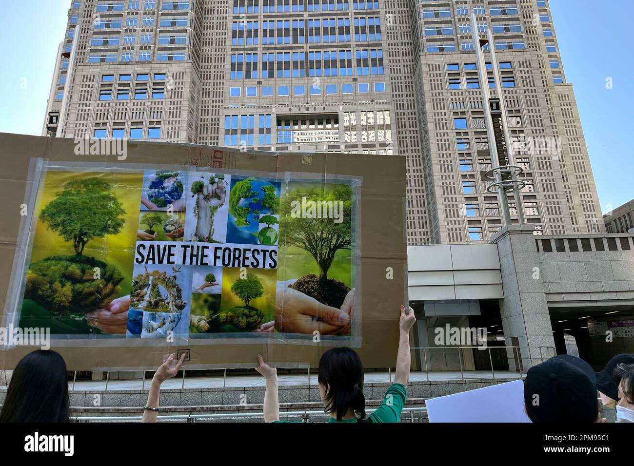 People gather in front of the Tokyo Metropolitan Government Building in ...