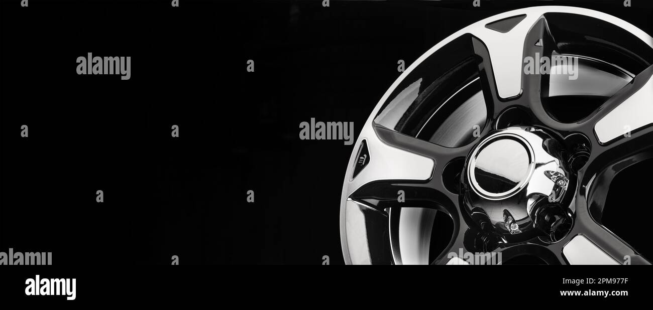 Beautiful powerful alloy wheels for SUVs close-up on a black background ...
