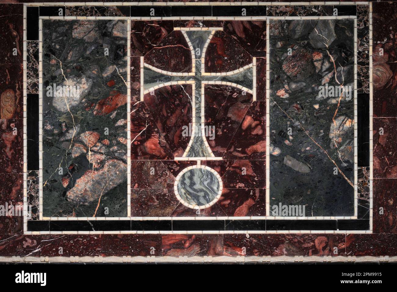 Grey Germanic or Teutonic cross inlaid in reddish-pink and dark grey ...