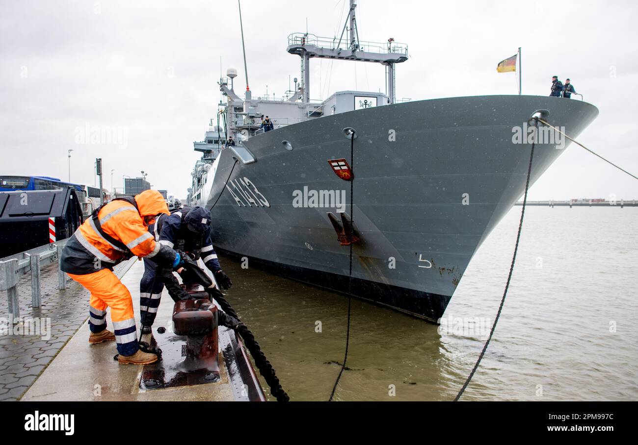 Wilhelmshaven, Germany. 12th Apr, 2023. Navy personnel remove the ...