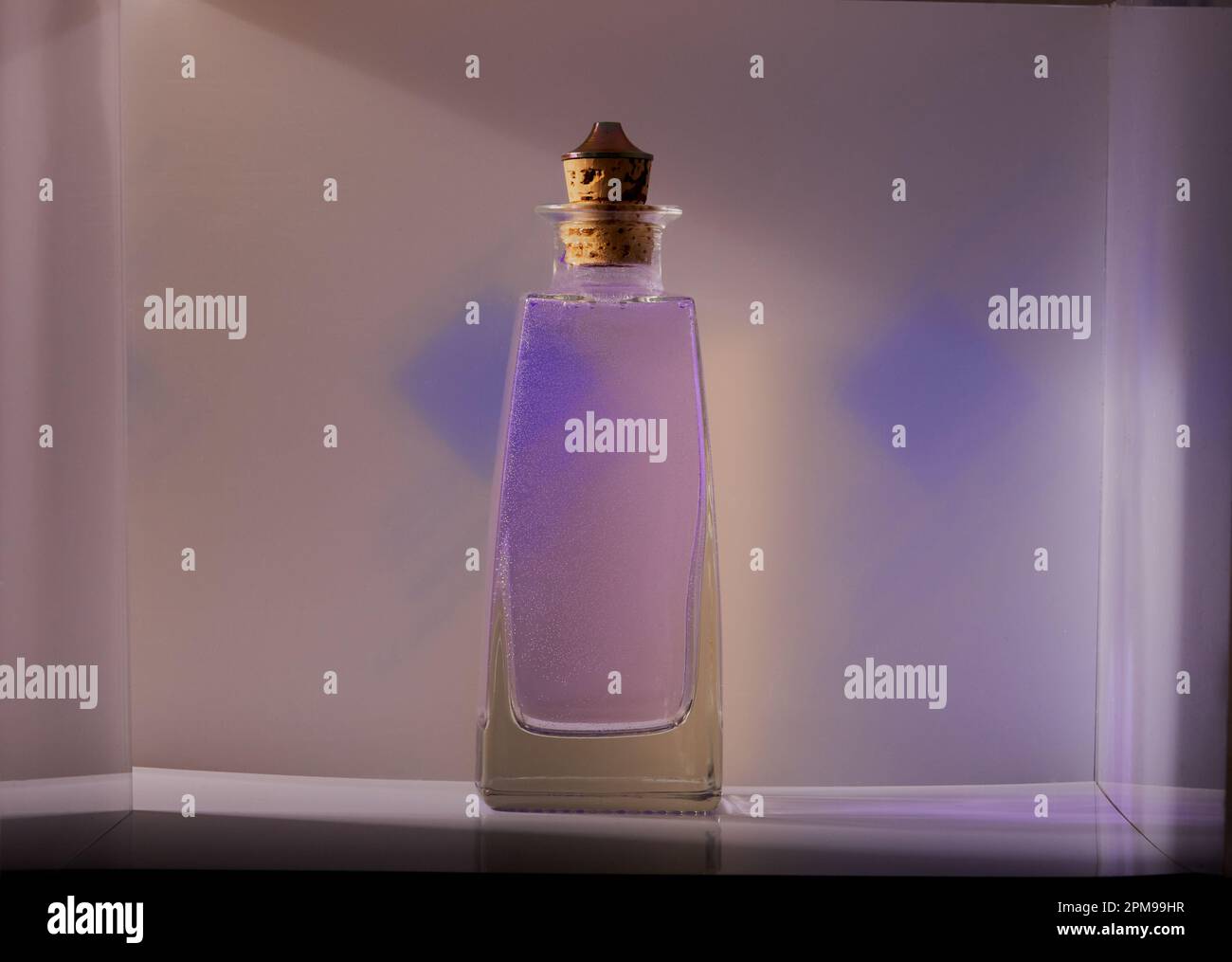 Antique fragrance bottle with window light shinning on it Stock Photo ...