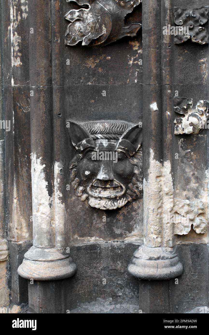 Gargoyle or Grotesque face adorning the entrance porch to St Mary's ...