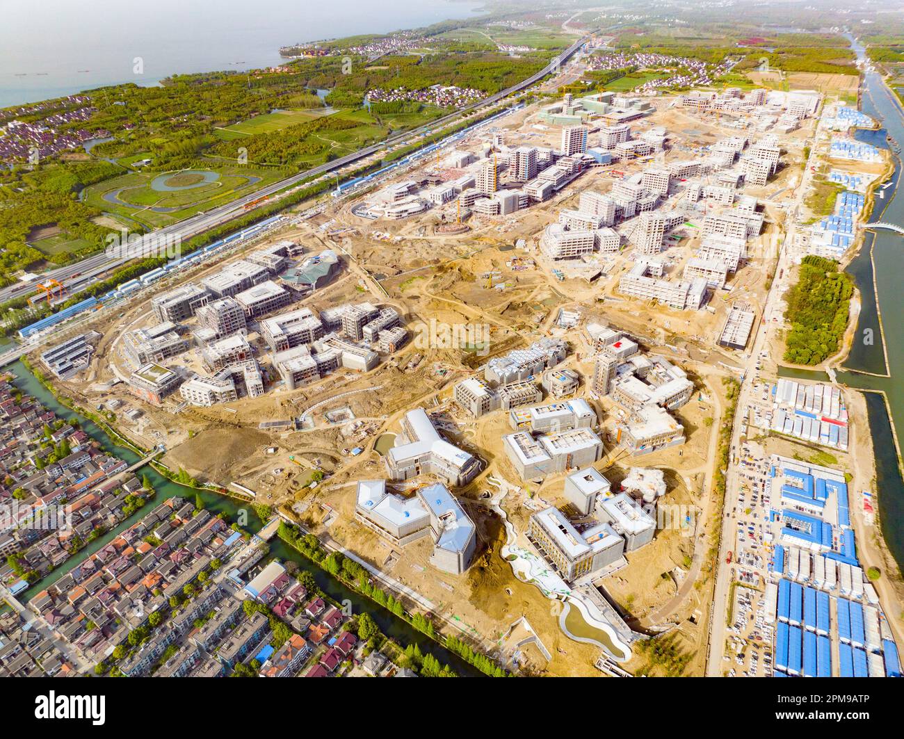 SHANGHAI, CHINA - APRIL 12, 2023 - Builders, along with hundreds of ...