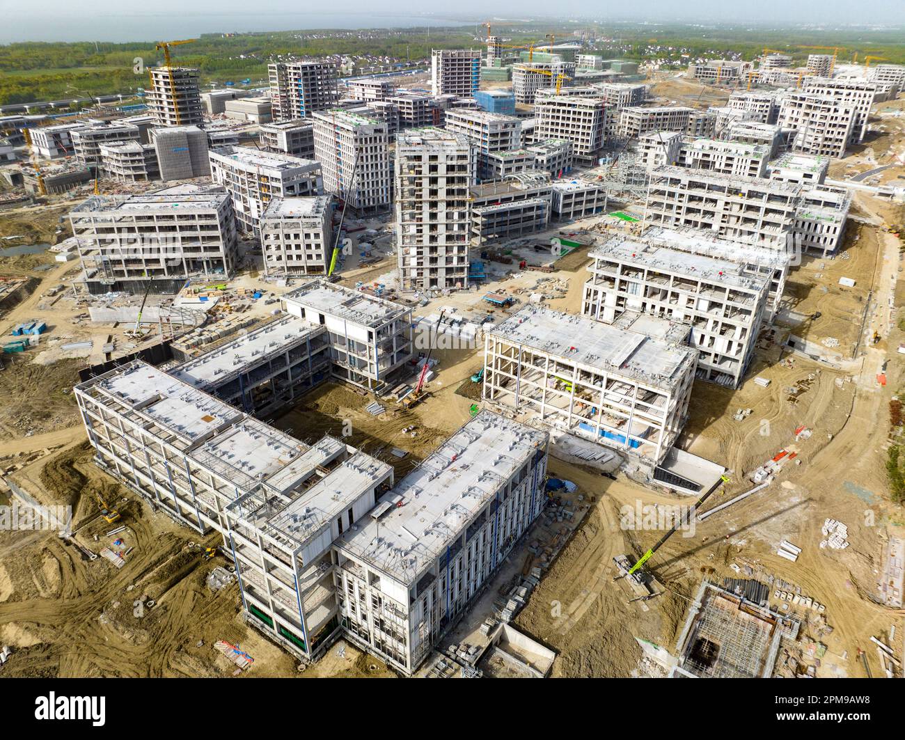 SHANGHAI, CHINA - APRIL 12, 2023 - Builders, along with hundreds of ...