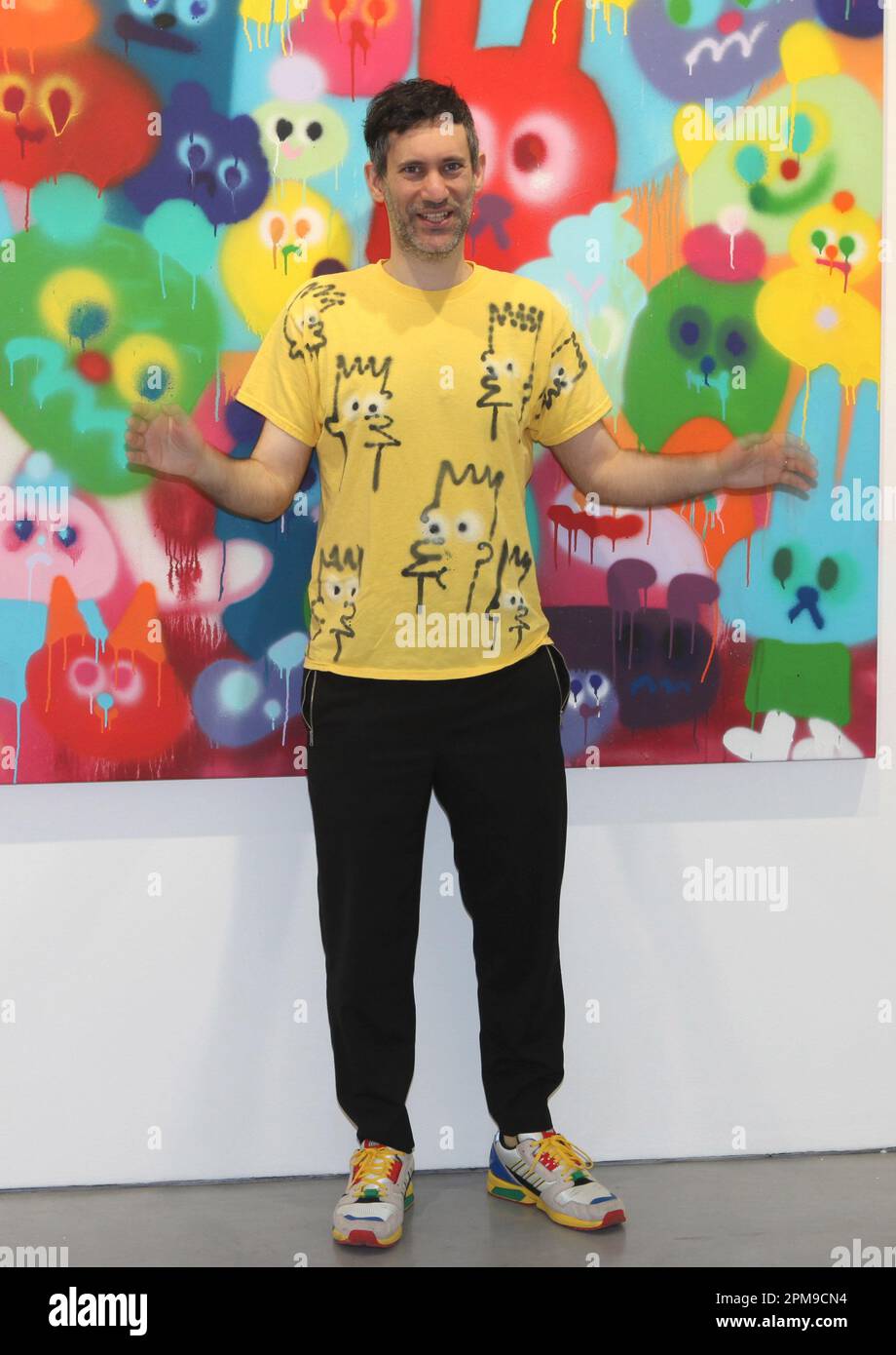 London, UK. British born artist Jon Burgerman poses with his painting ...