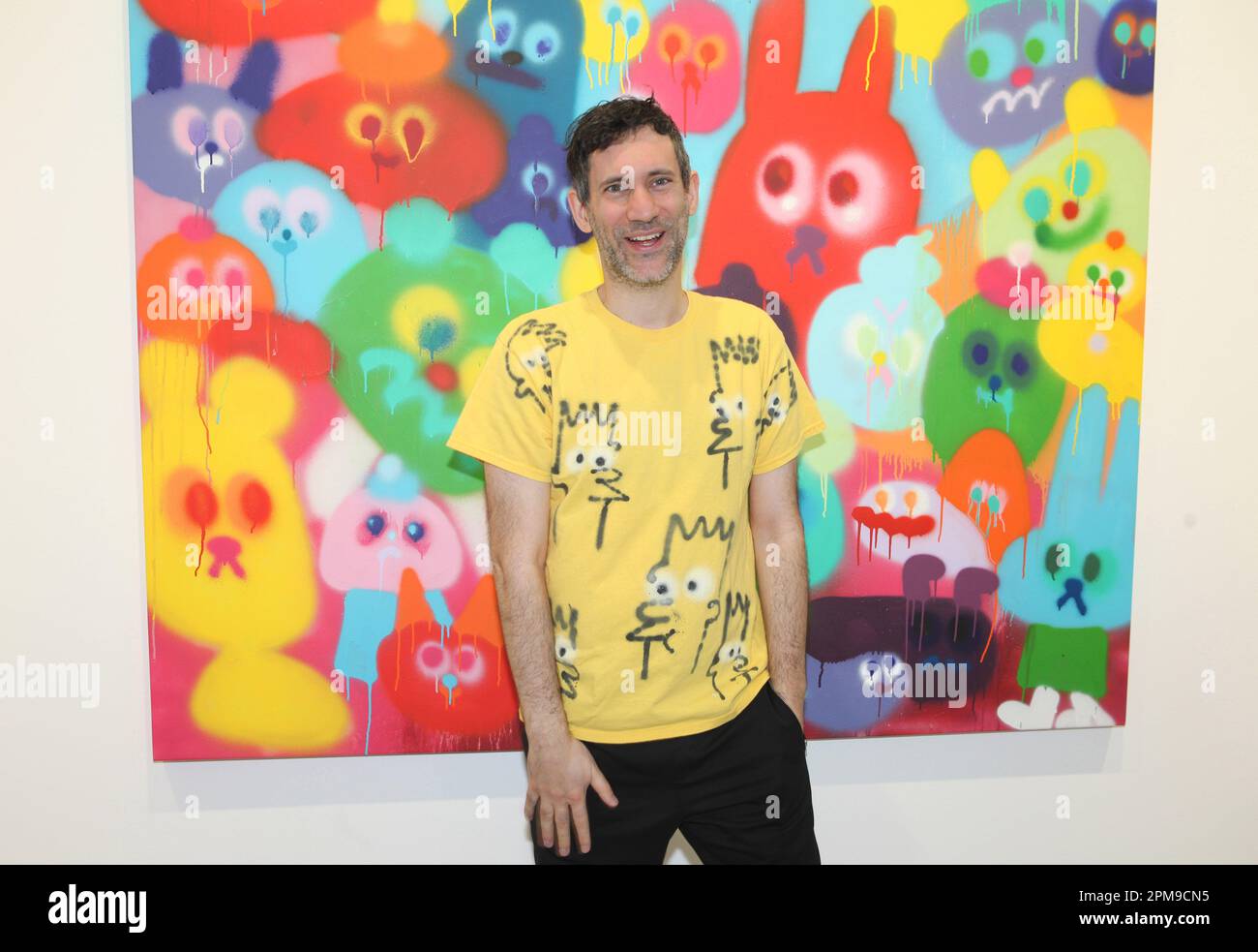 London, UK. British born artist Jon Burgerman poses with his painting ...