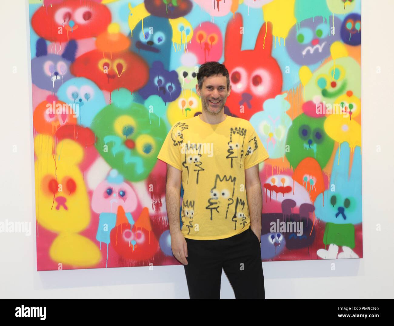London, UK. British born artist Jon Burgerman poses with his painting ...