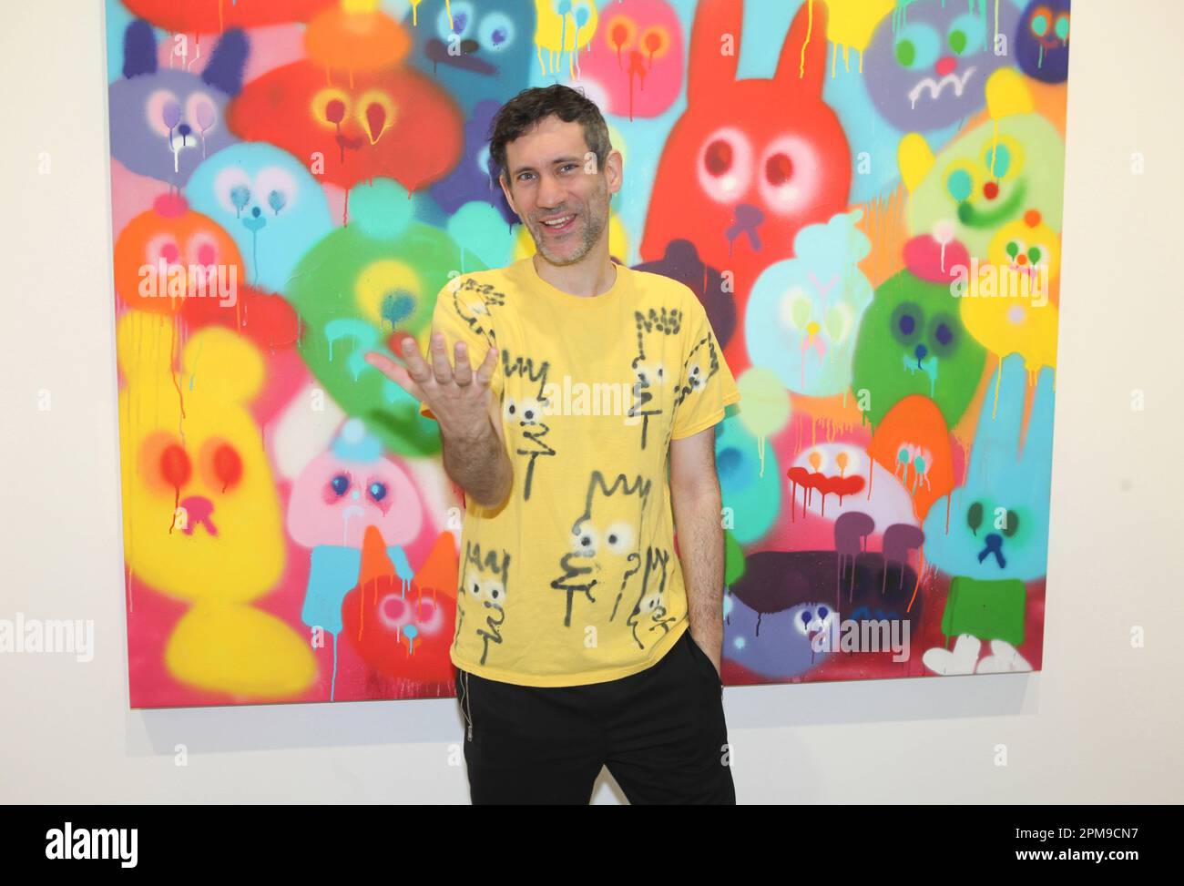 London, UK. British born artist Jon Burgerman poses with his painting ...