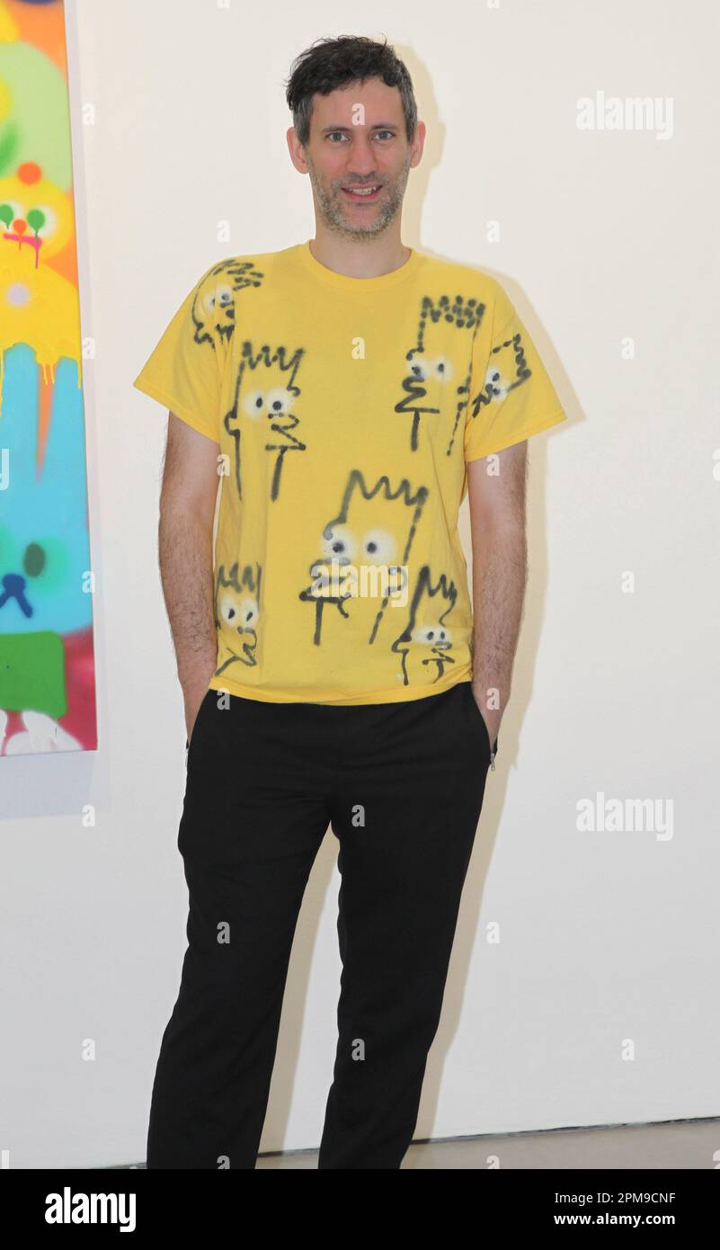 London, UK. British born artist Jon Burgerman poses with his painting ...