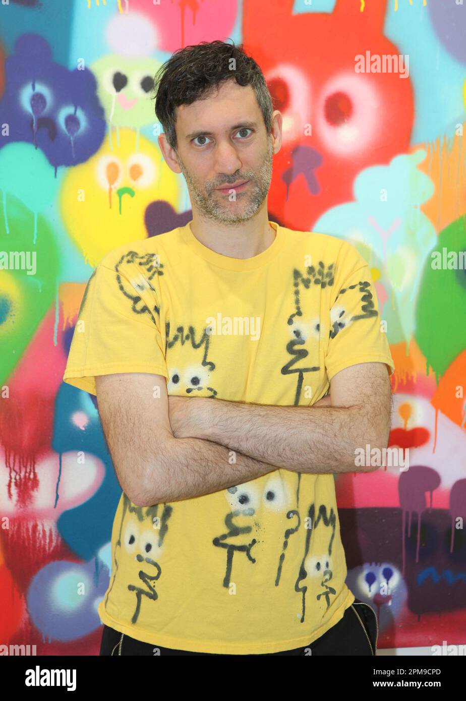 London, UK. British born artist Jon Burgerman poses with his painting ...
