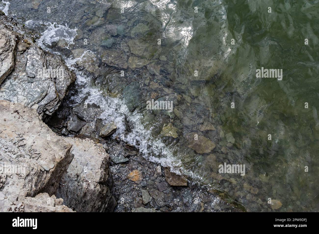 river water, surf, rocky shore, top view of clear reservoir water Stock ...