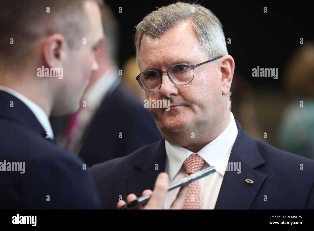 Sir Jeffery Donaldson MP (right), leader of the DUP, following a speech ...