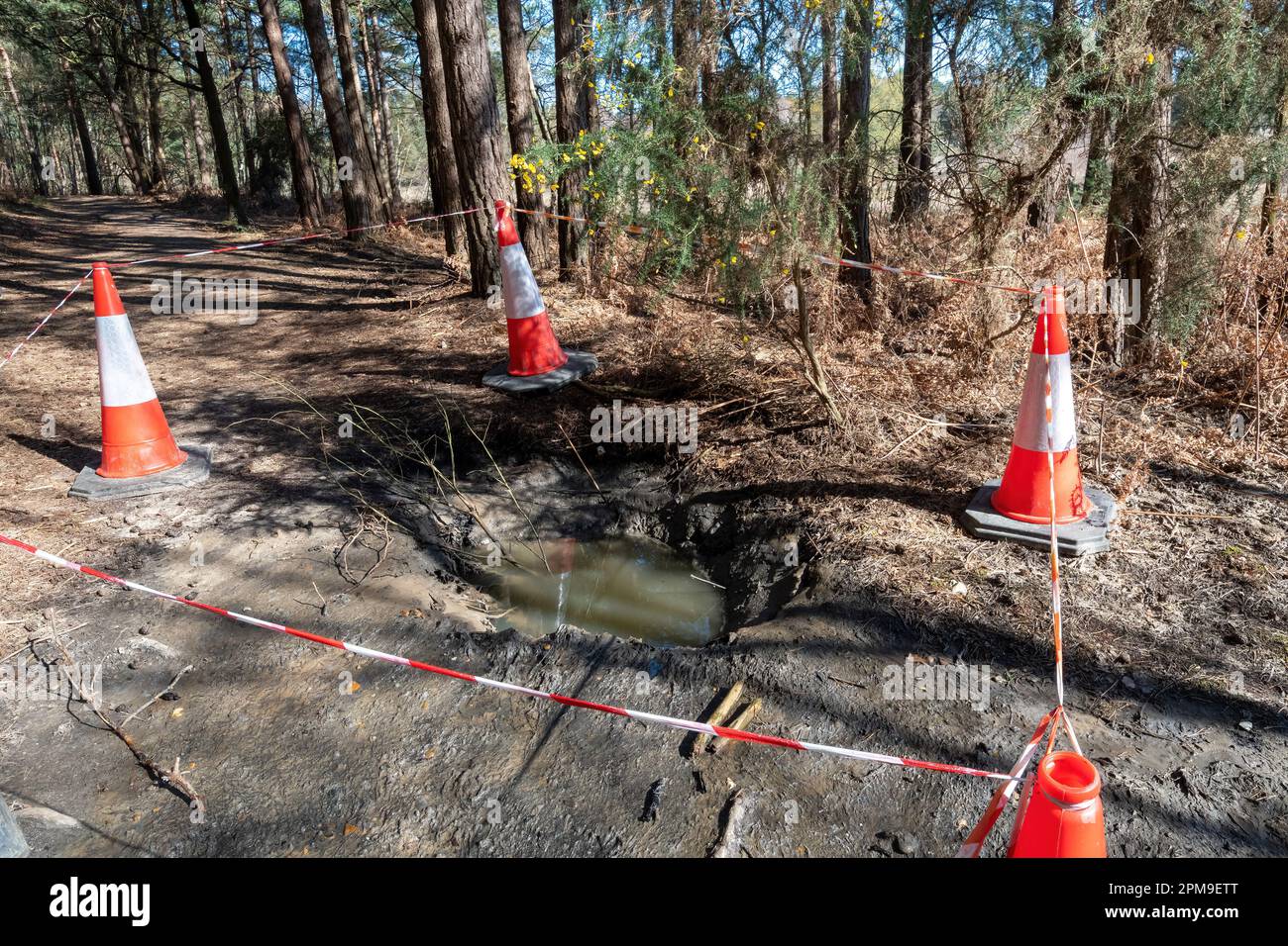 Sink hole (sinkhole) in a countryside path Stock Photo - Alamy