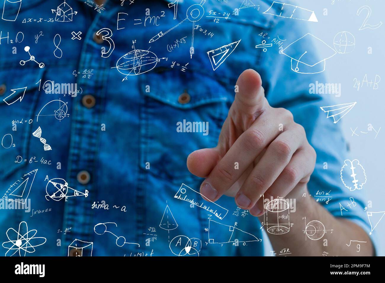 Student or teacher with mathematical and scientific formulas. Concepts ...