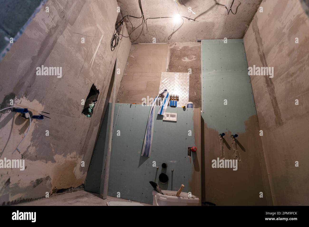 Working process of installing metal frames for plasterboard -drywall ...