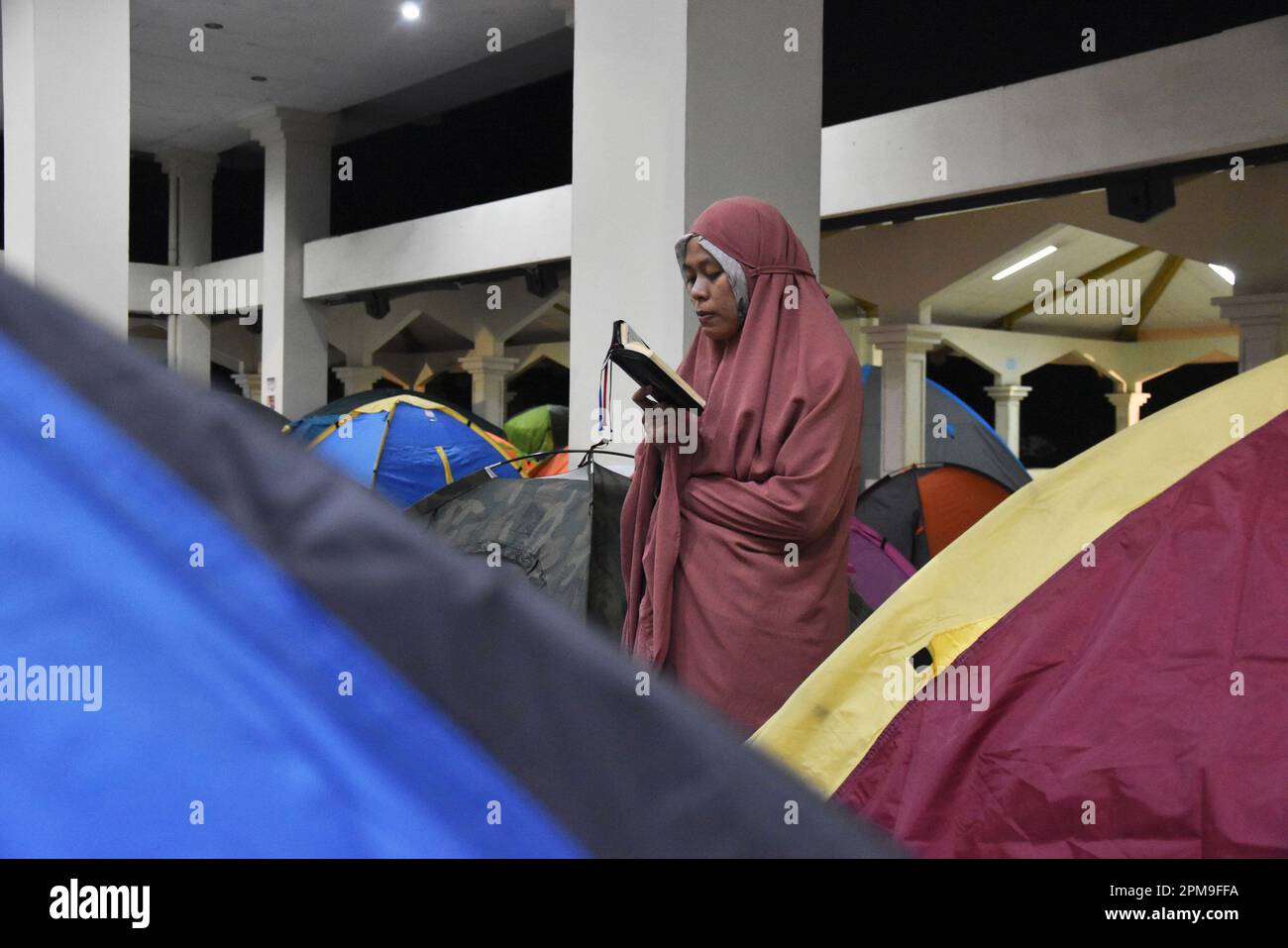 Bandung, Indonesia. 12th Apr, 2023. A Muslim woman performing night ...