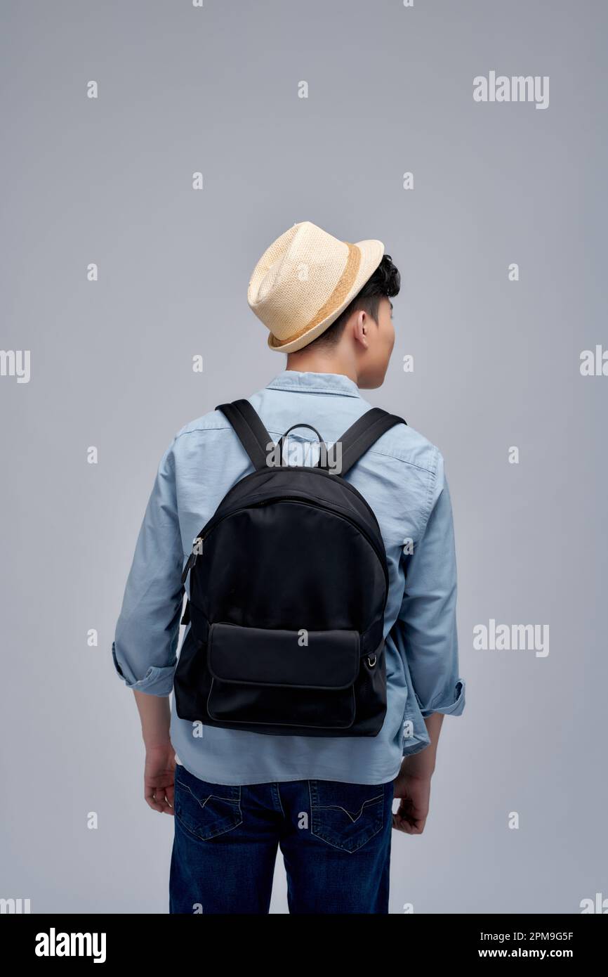 Back view young traveling man hi-res stock photography and images - Alamy