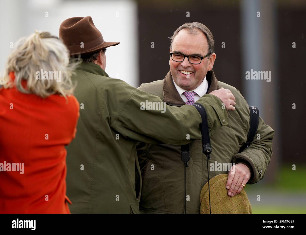 Trainer Nicky Henderson (left) greets trainer Alan King before the ...