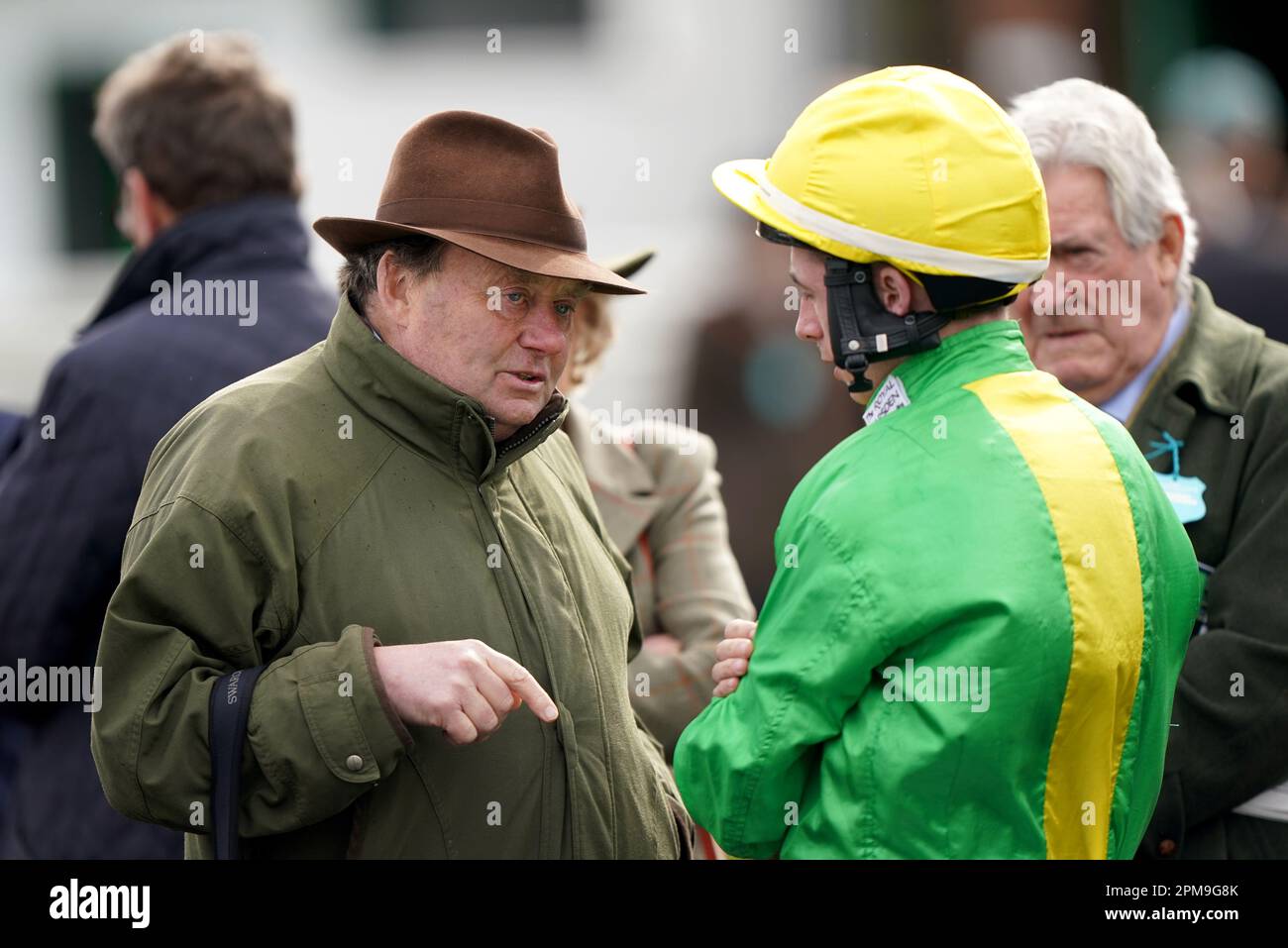 Trainer Nicky Henderson speaks to jockey Rossa Ryan before the Barry ...