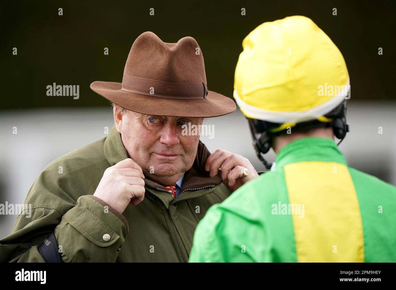 Trainer Nicky Henderson speaks to jockey Rossa Ryan before the Barry ...