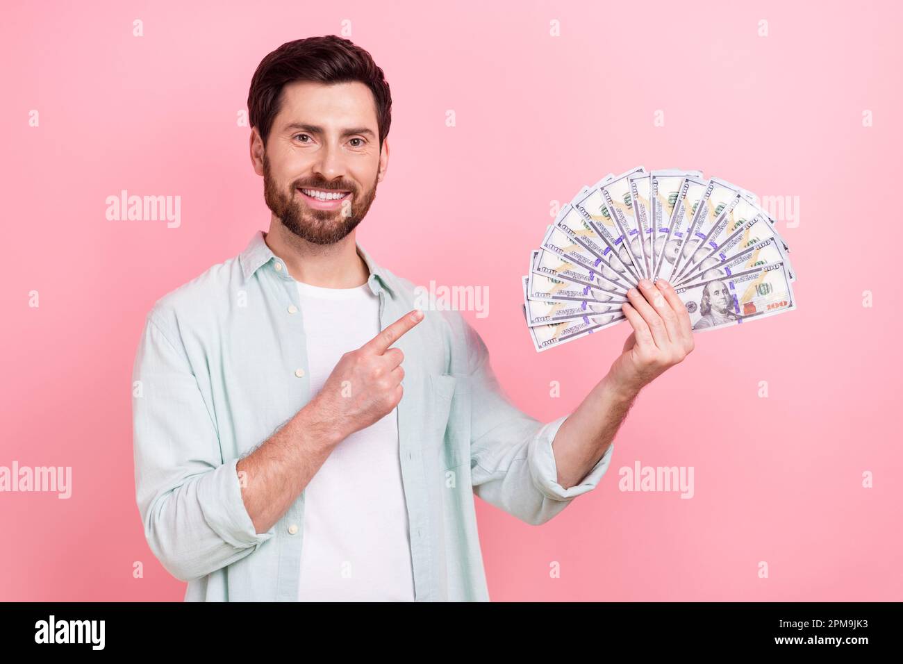 Photo of young successful entrepreneur demonstrating finger point much ...