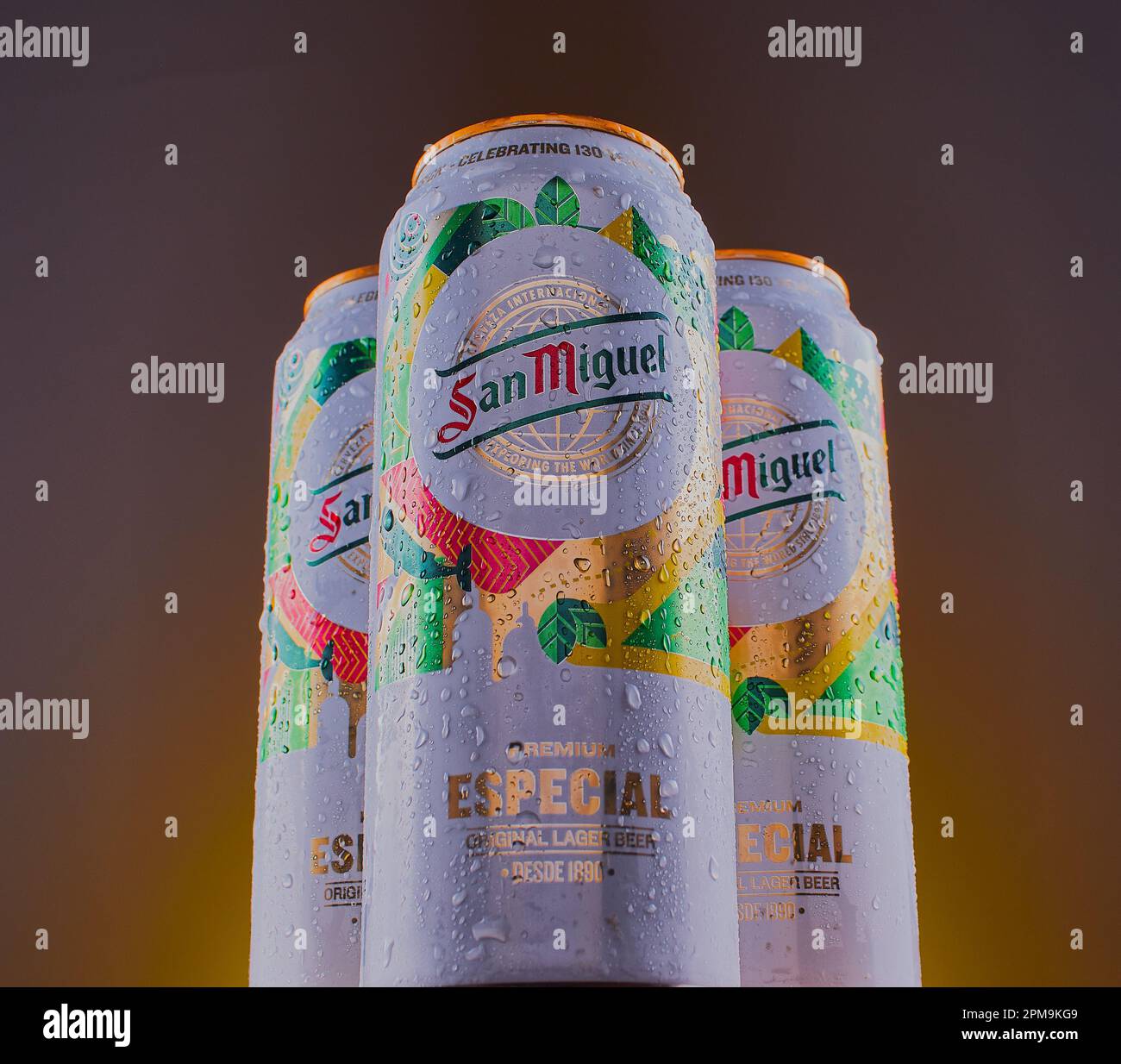 Cold cans of San Miguel on a yellow gradient background,Studio product ...