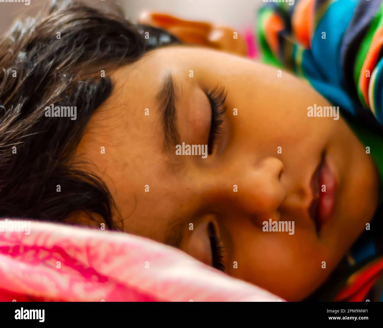 A portrait of an Indian boy sleeping / napping Stock Photo - Alamy