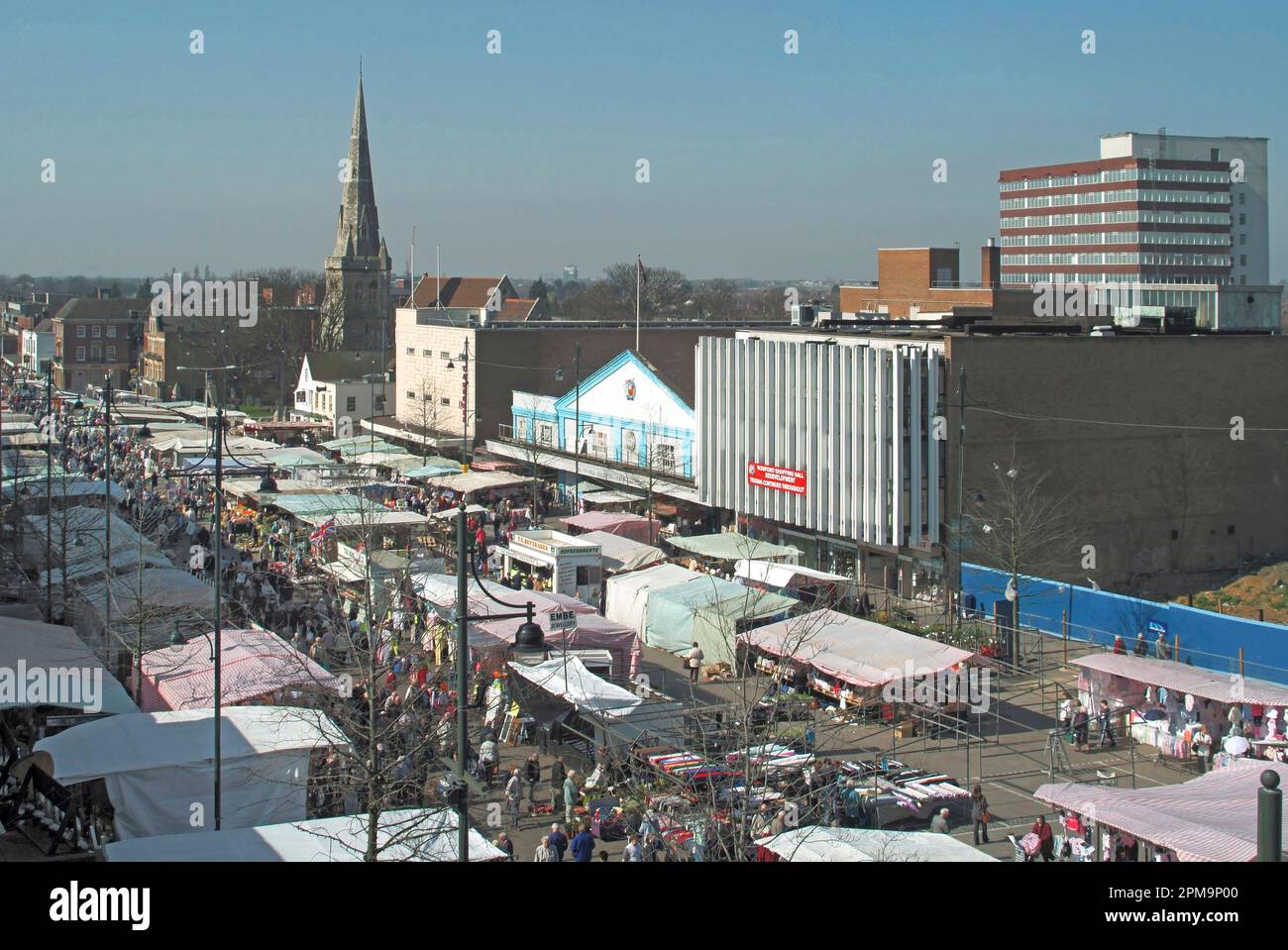 Aerial view shoppers in Romford at large outdoor retail market in urban ...
