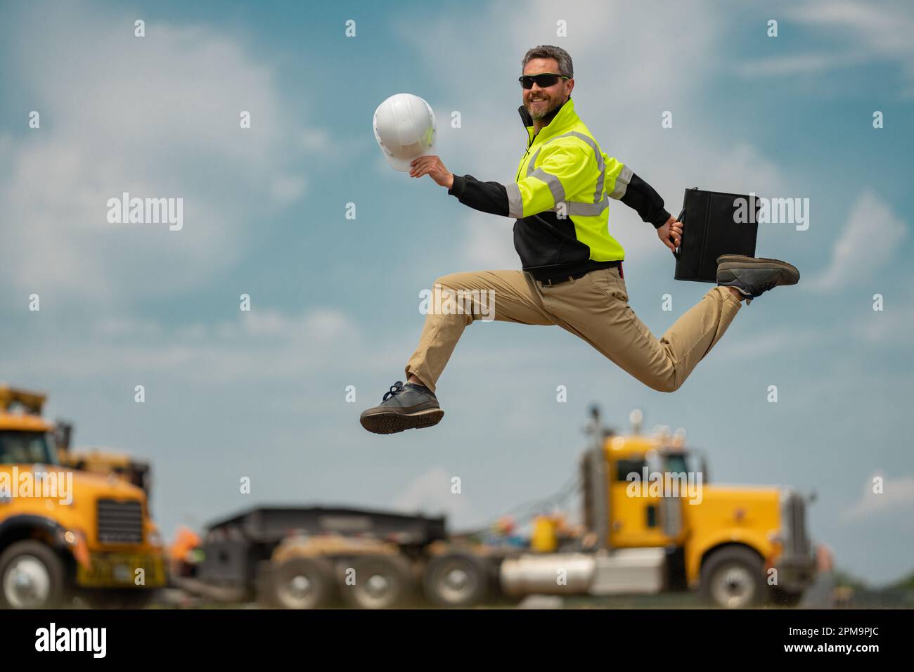 Construction worker excited jump on construction site. Construction ...