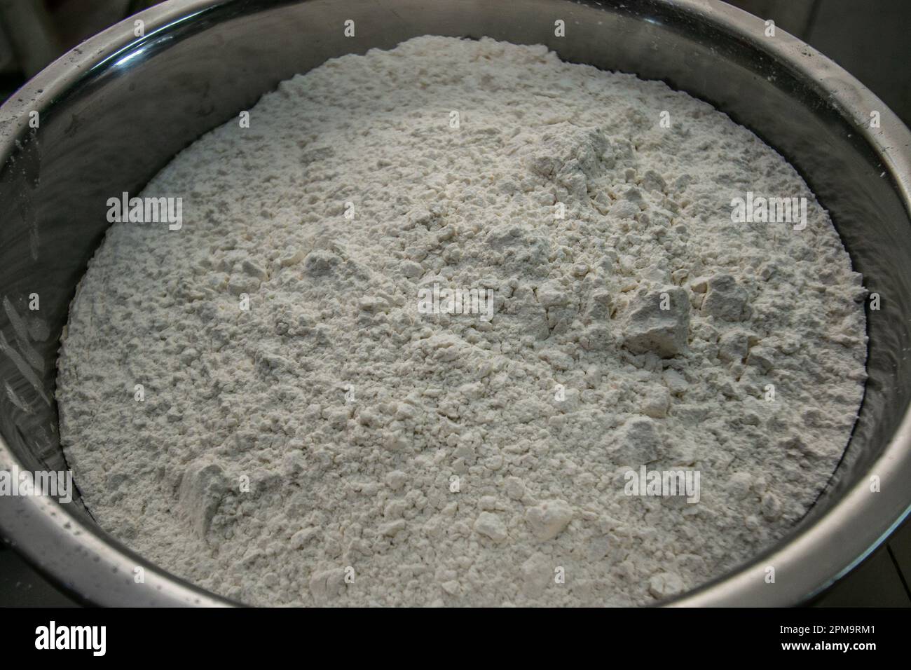raw flour in a silver bowl Stock Photo - Alamy