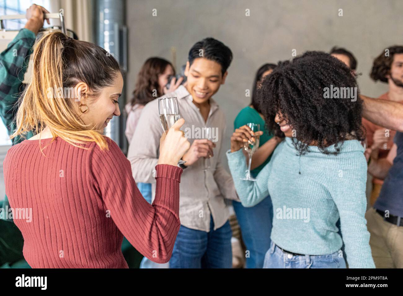 Large group of people organize a party with music and dance in a ...