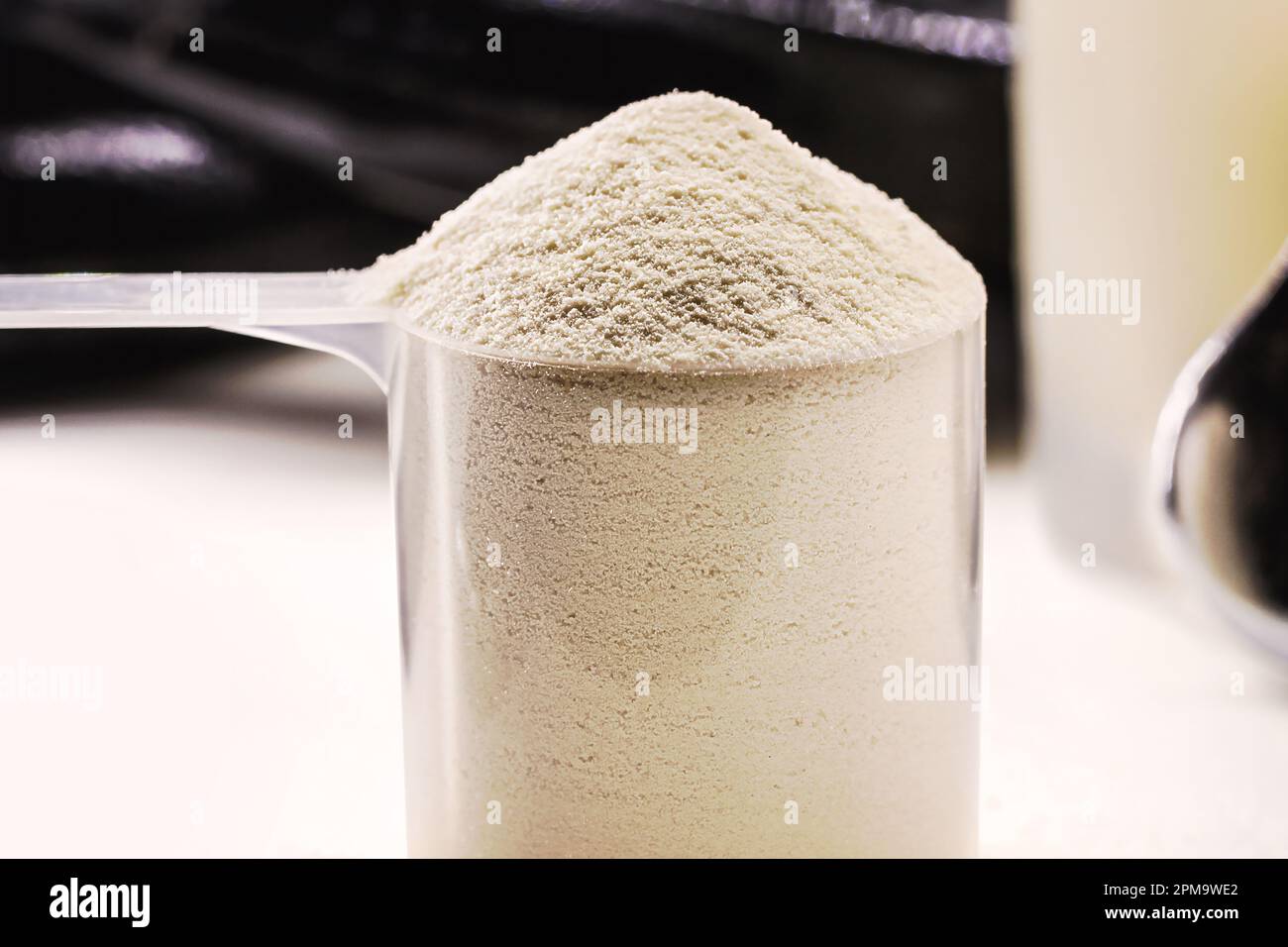 measuring spoon with creatine, whey or casein, whey supplements ...