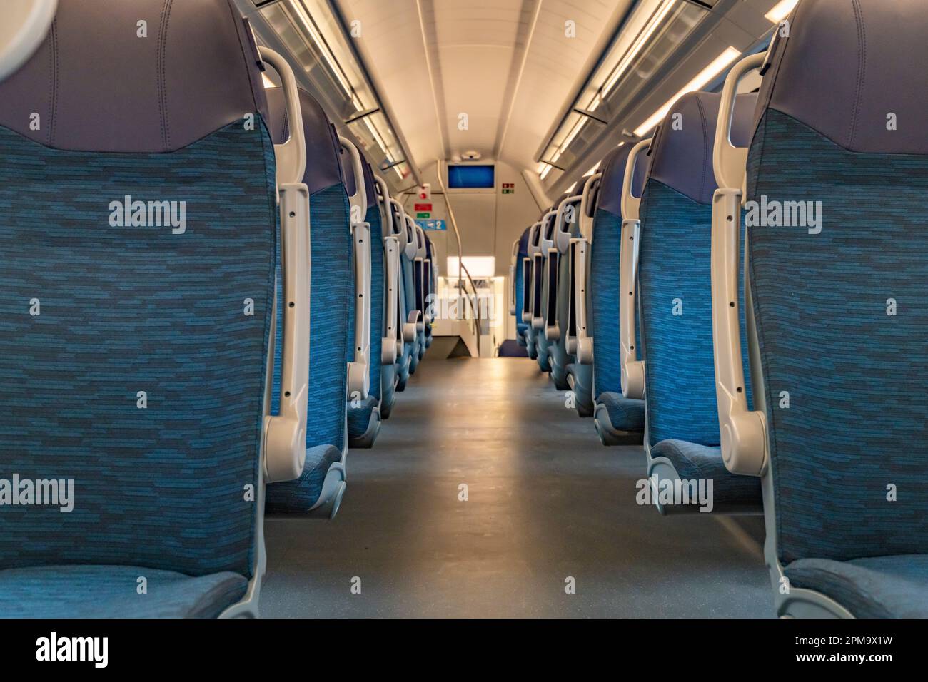 Interior train blue seats hi-res stock photography and images - Alamy