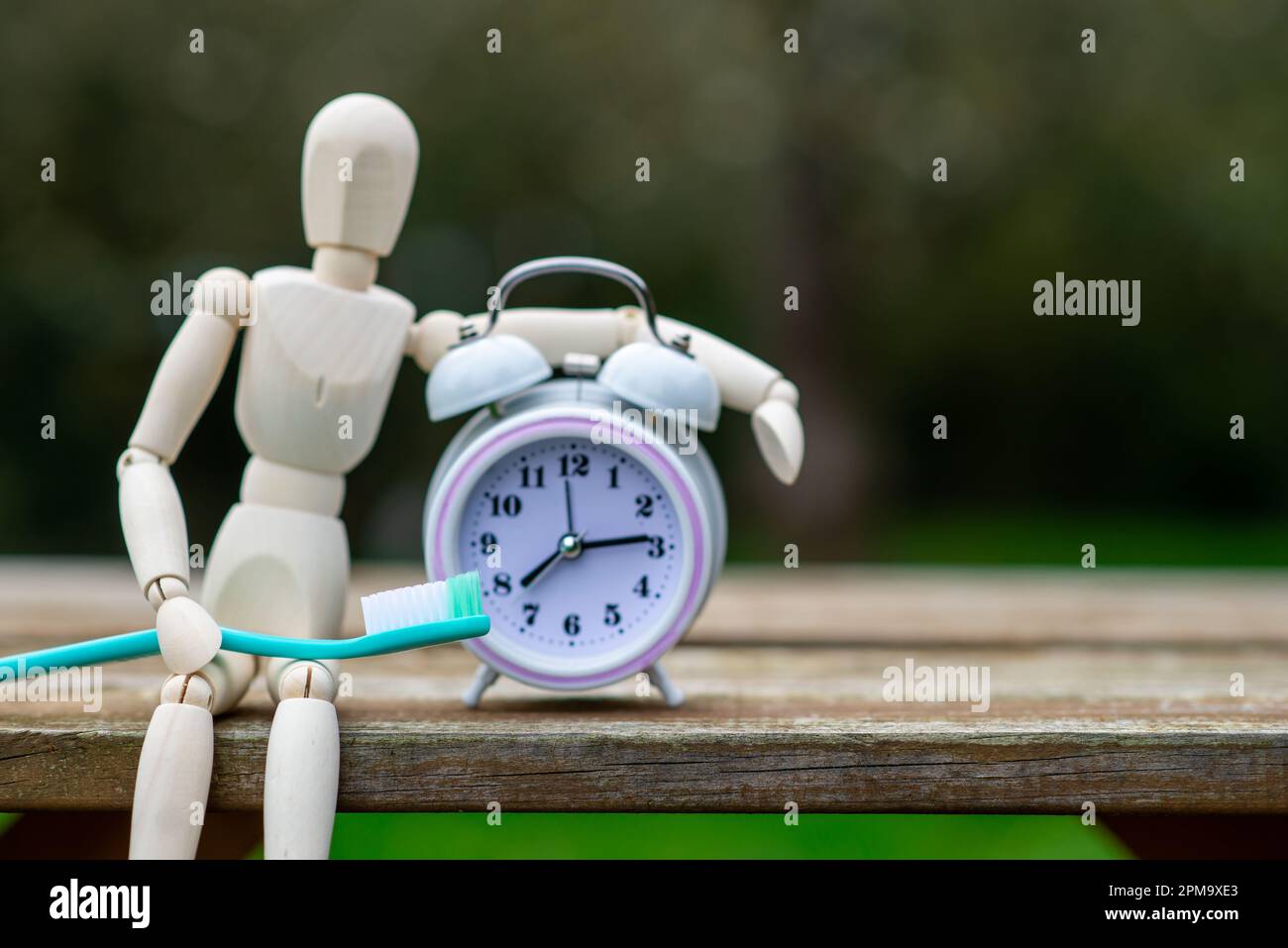 time to brush your teeth concept. Toothbrush in the hands of a human ...