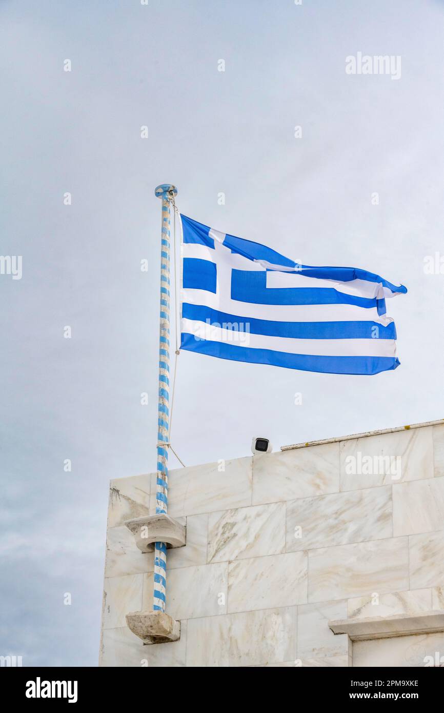 Greek flag, flag waving in the wind, Panagia Tourliani Monastery, Ano ...