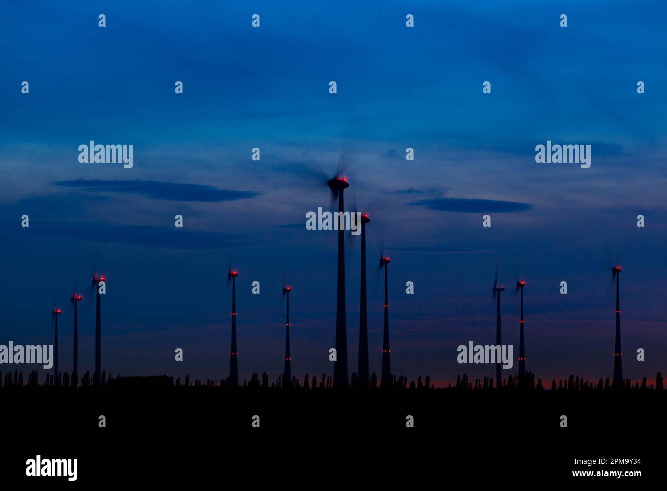 Wind turbine at night Stock Photo - Alamy