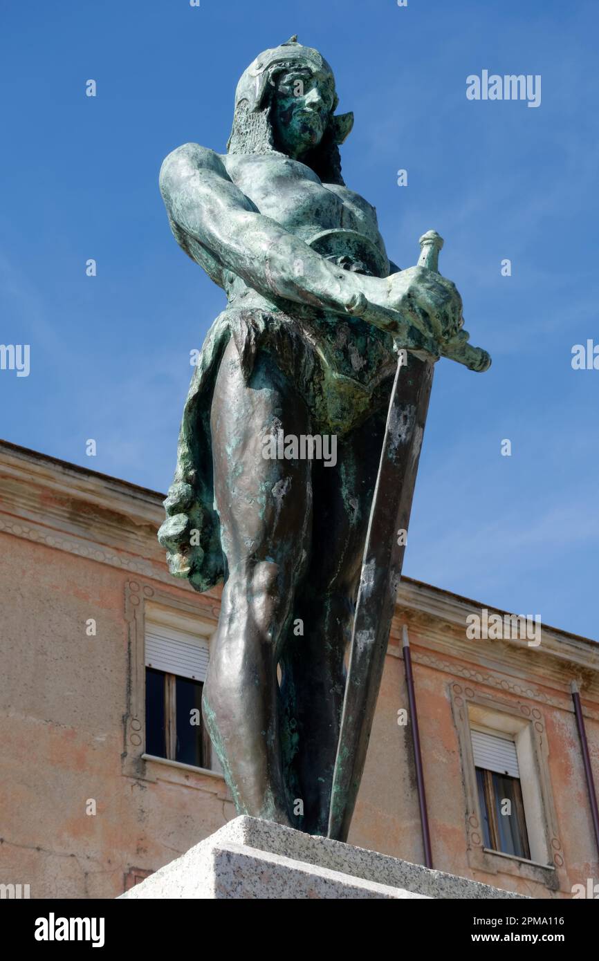 Statue of an ancient warrior in Arzachena Sardinia Stock Photo - Alamy