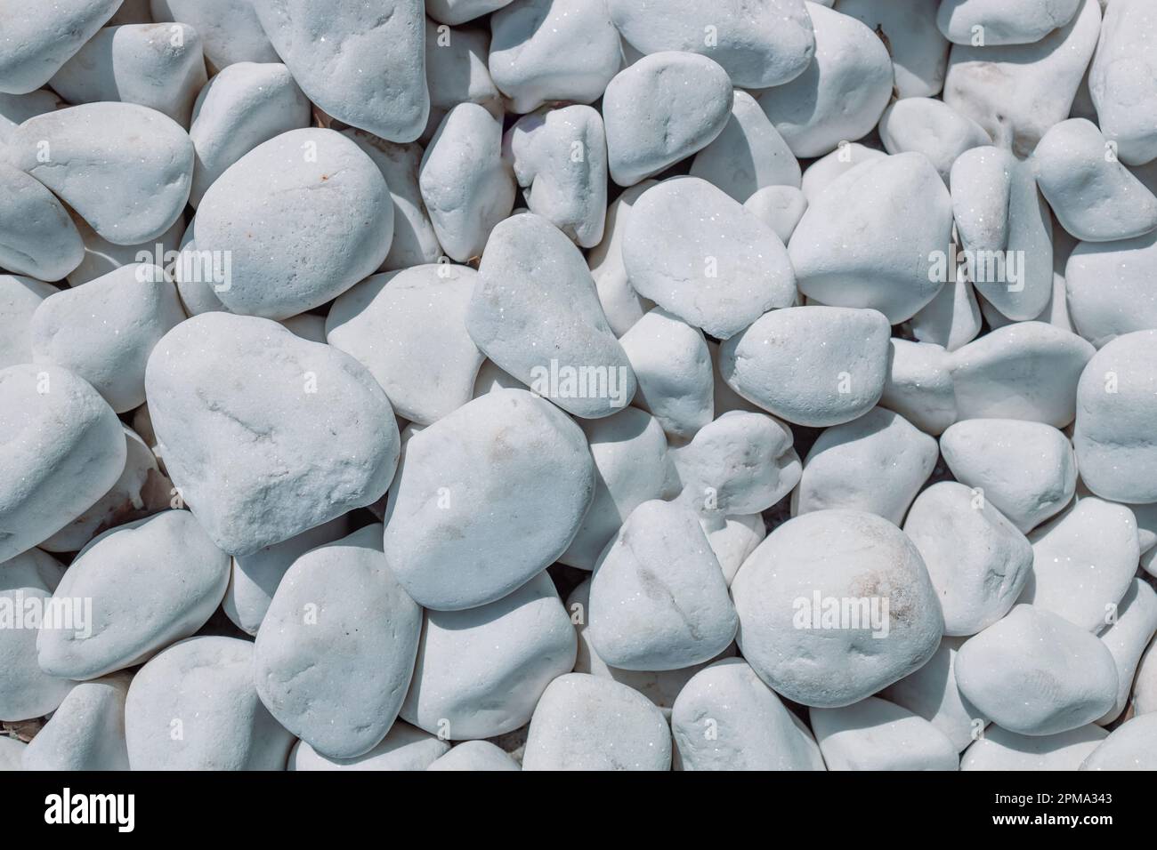 Beautiful textured background image of white sea pebbles with volume ...