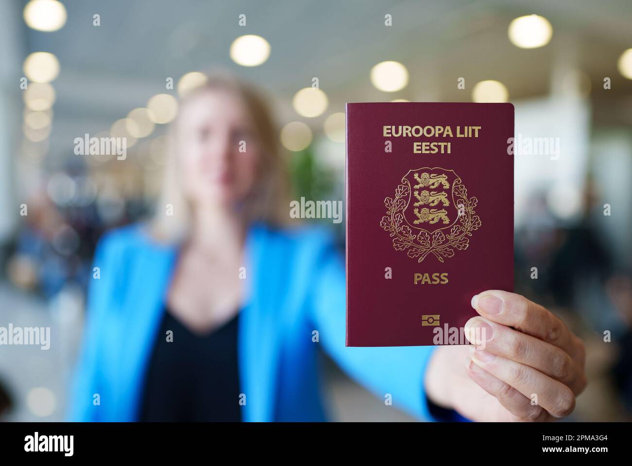 Woman showing europe union passport. Estonian citizenship Stock Photo ...