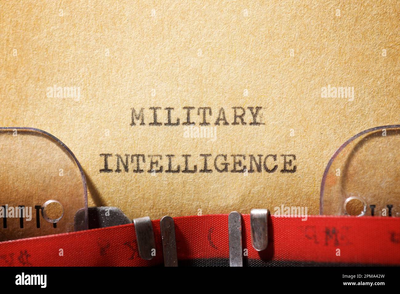 Military Intelligence text written with a typewriter Stock Photo - Alamy