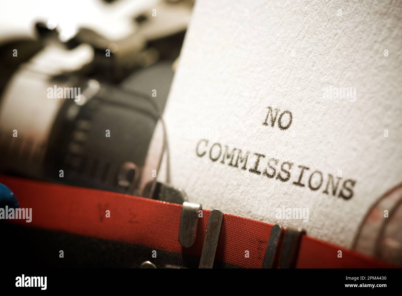 No commissions text written with a typewriter Stock Photo - Alamy