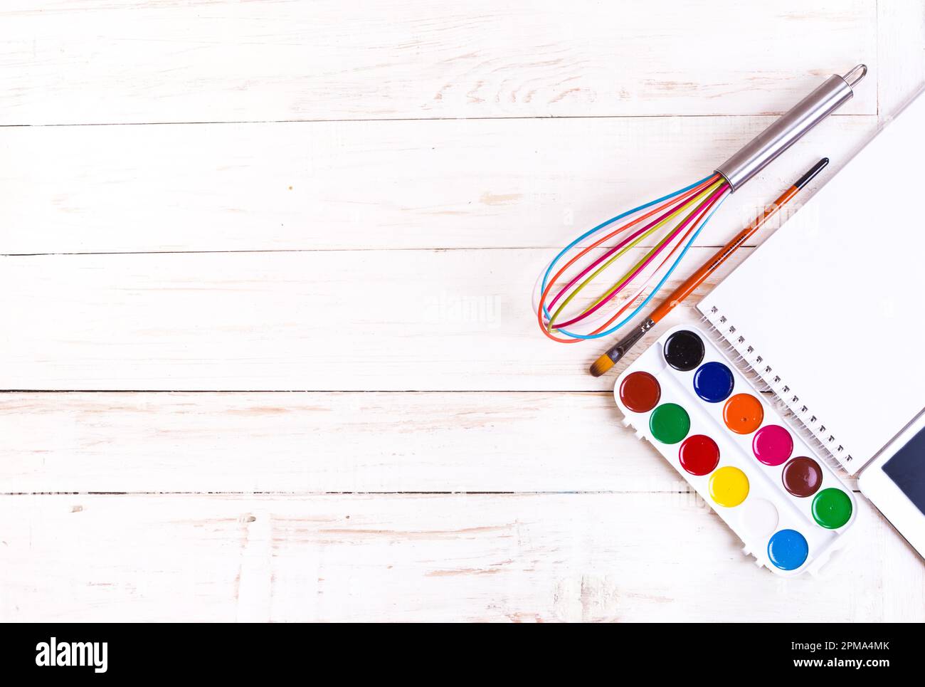 Sketch pad with paints, brush, whisk and tablet. Concept of creativity ...